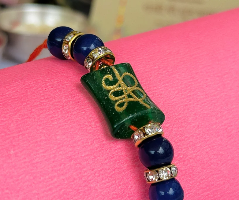 Dhwani Astro | Lapis Lazuli Money Coin Reiki Symbol Rakhi - Abhimantrit